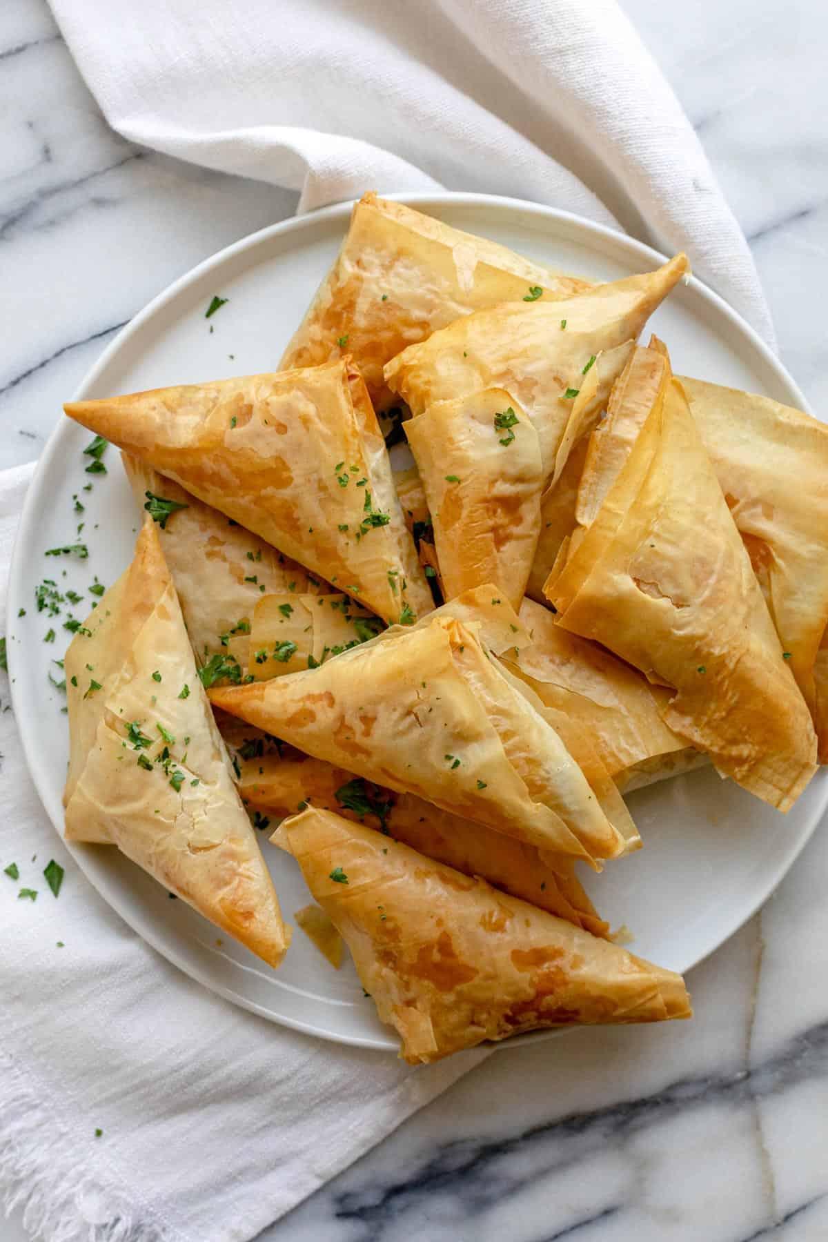 Flaky Spinach and Feta Pastry Triangles Recipe | Savory Touch
