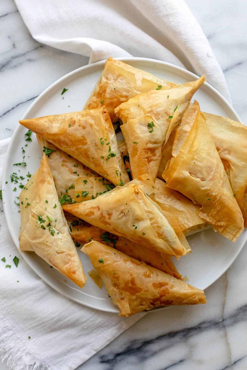 Flaky Spinach and Feta Pastry Triangles Recipe | Savory Touch